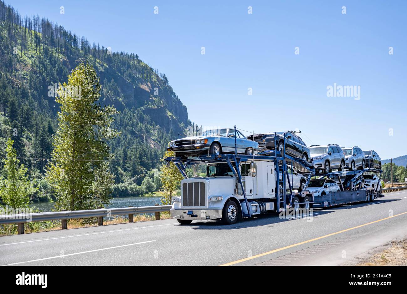 Industrial Big rig white classic car hauler semi truck tractor ...