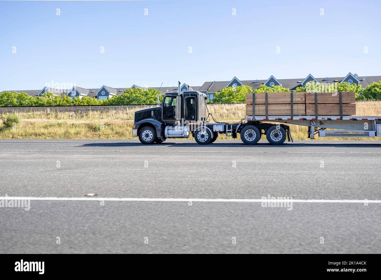 Classic style bonnet black big rig semi truck tractor with extended cab ...