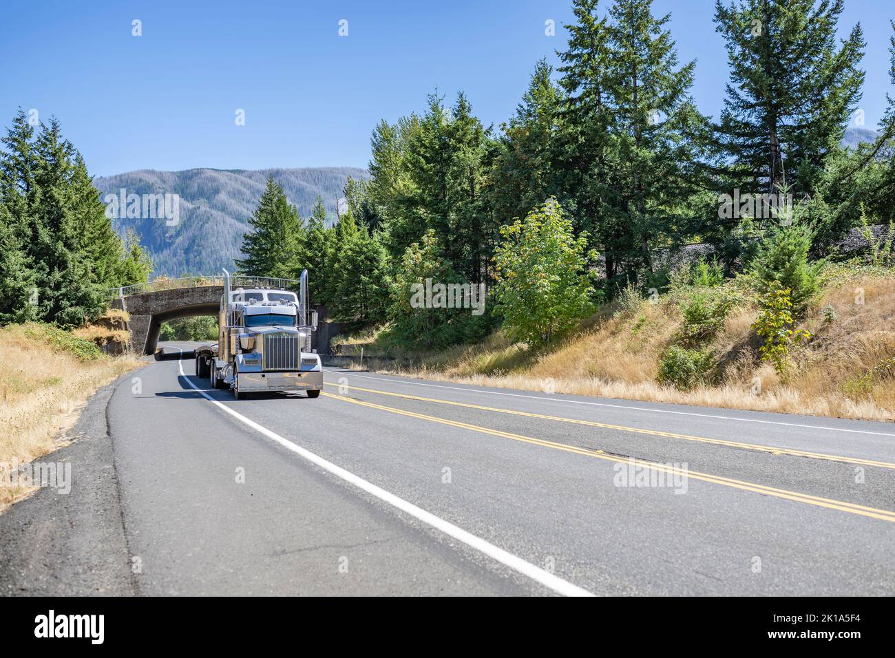 Classic style white big rig semi truck tractor with extended cab ...
