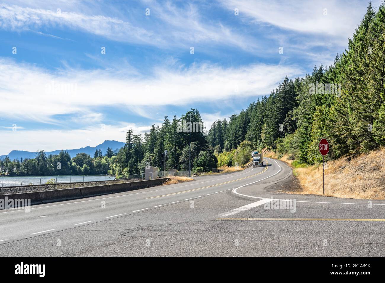 Convoy of Industrial long haul classic big rigs semi trucks ...