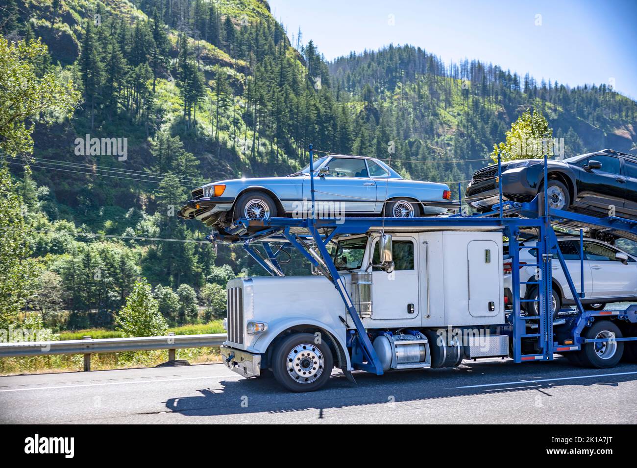 Industrial Big rig white classic car hauler semi truck tractor ...