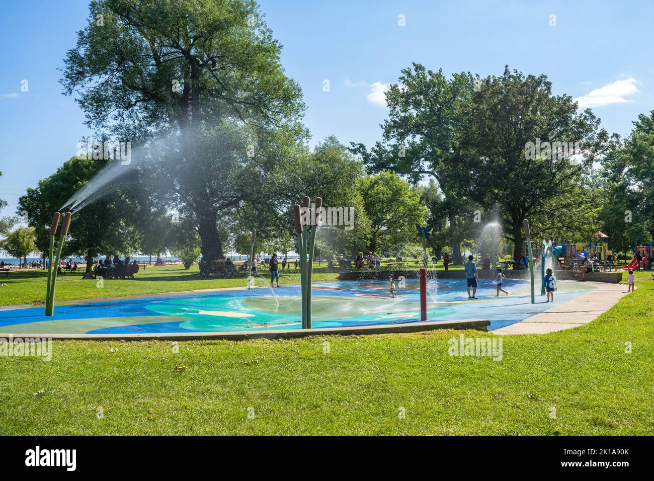 Kids having fun at playground in the Toronto Islands Centre Island Park ...