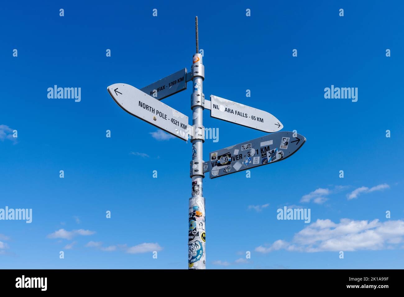 A road sign in Toronto Islands Park Centre Island Pier. Blue sky ...