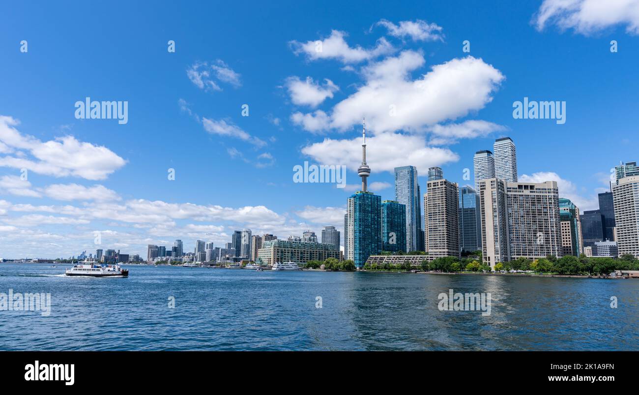 Toronto City downtown skyline. Toronto Island Ferry on inner Harbour ...