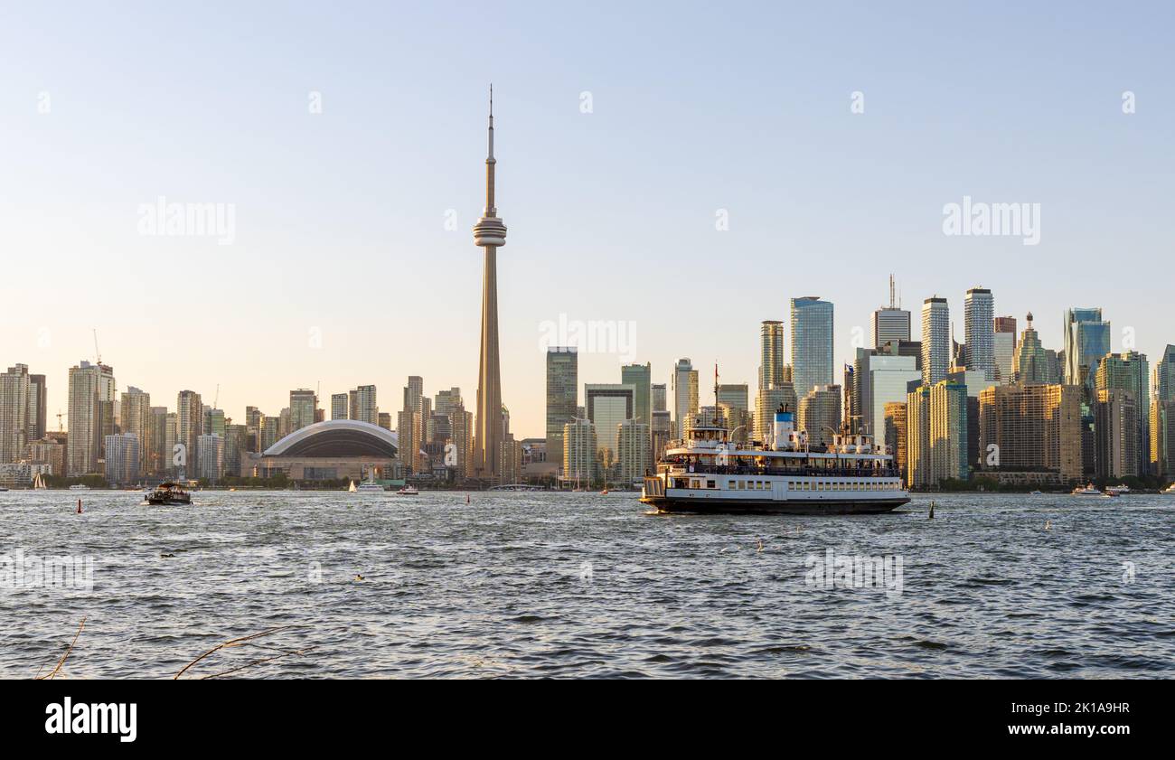 Toronto City downtown skyline at sunset time. Toronto Island Ferry on ...