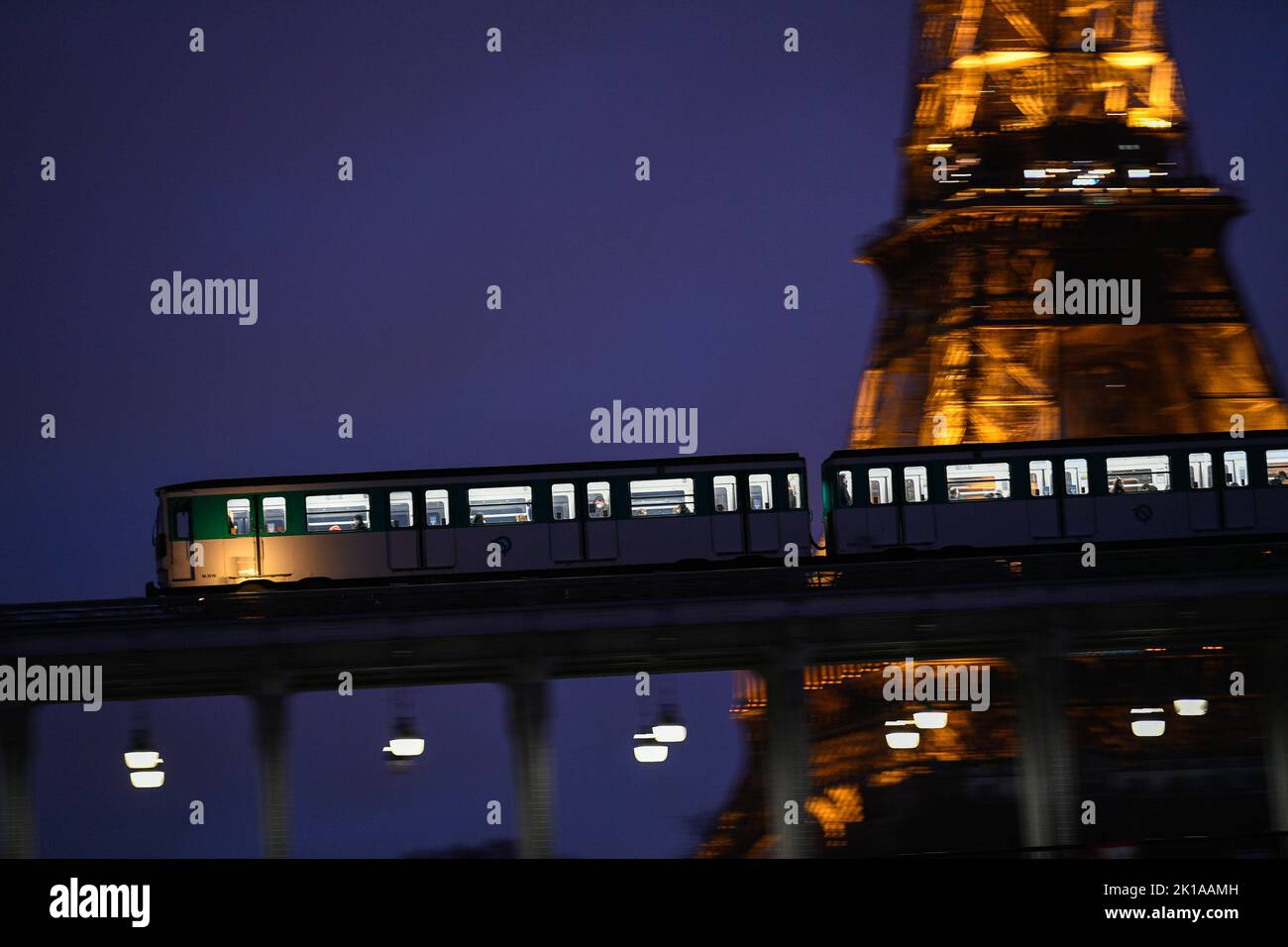 The parisian subway (metro, metropolitain) passes over a bridge with ...