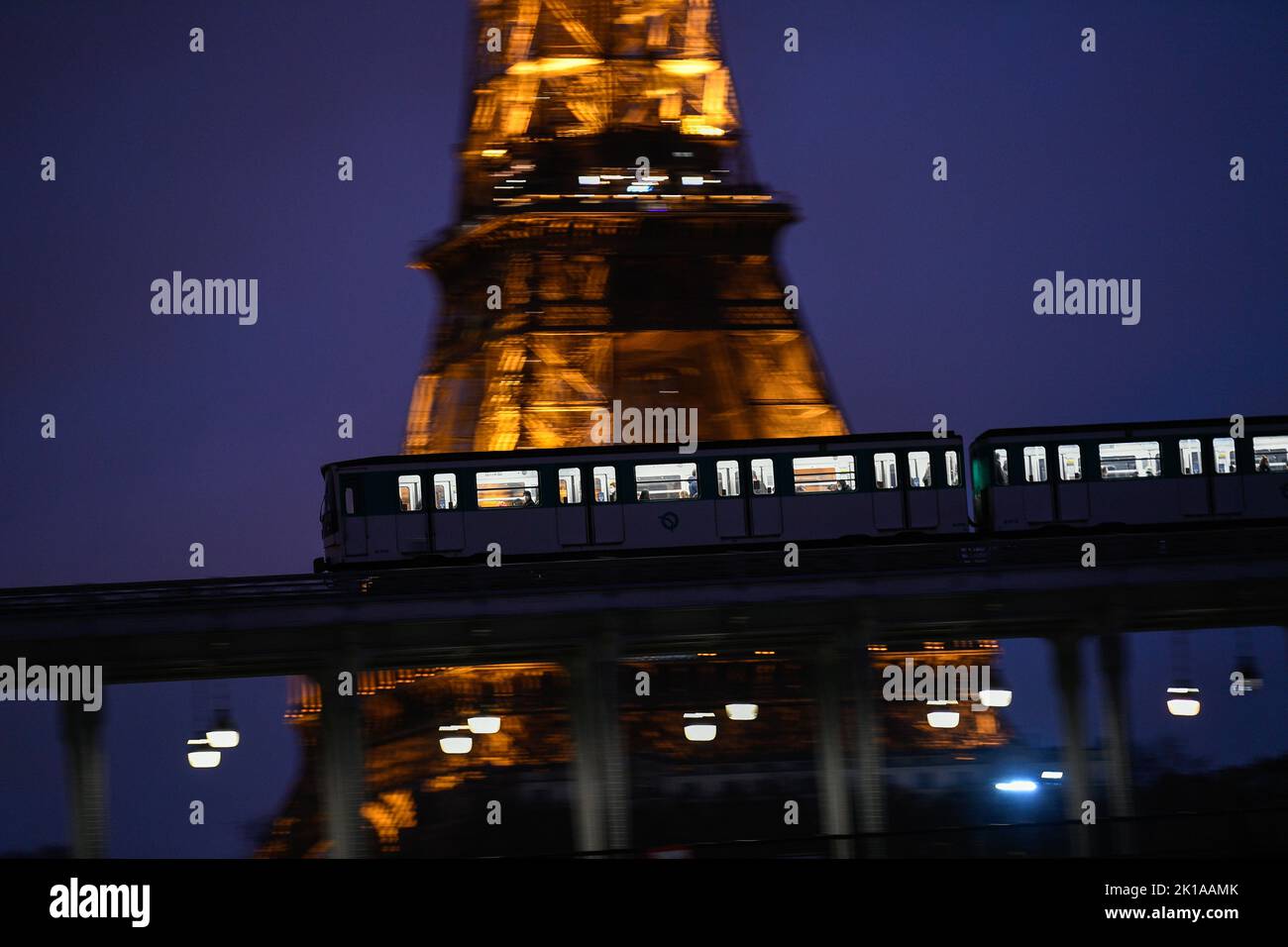 The parisian subway (metro, metropolitain) passes over a bridge with ...