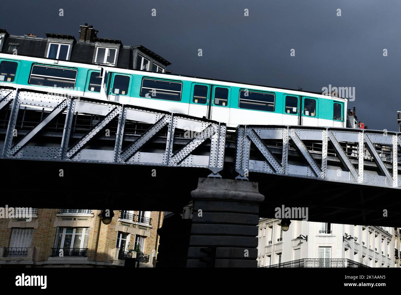 The parisian subway (metro, metropolitain) passes over a bridge in ...