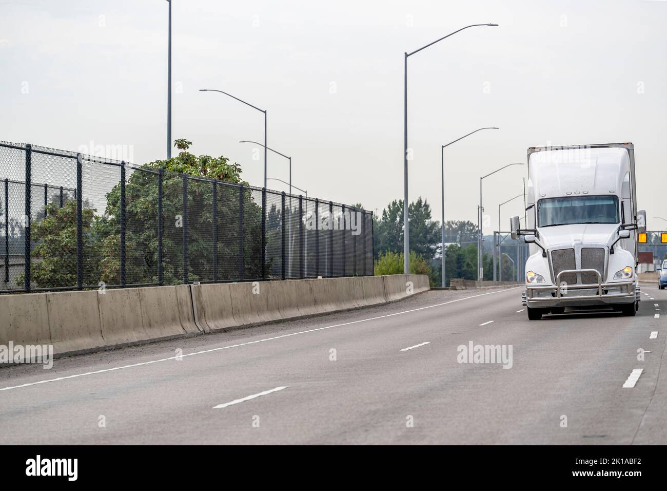 Long haul heavy duty professional white big rig semi truck tractor with ...