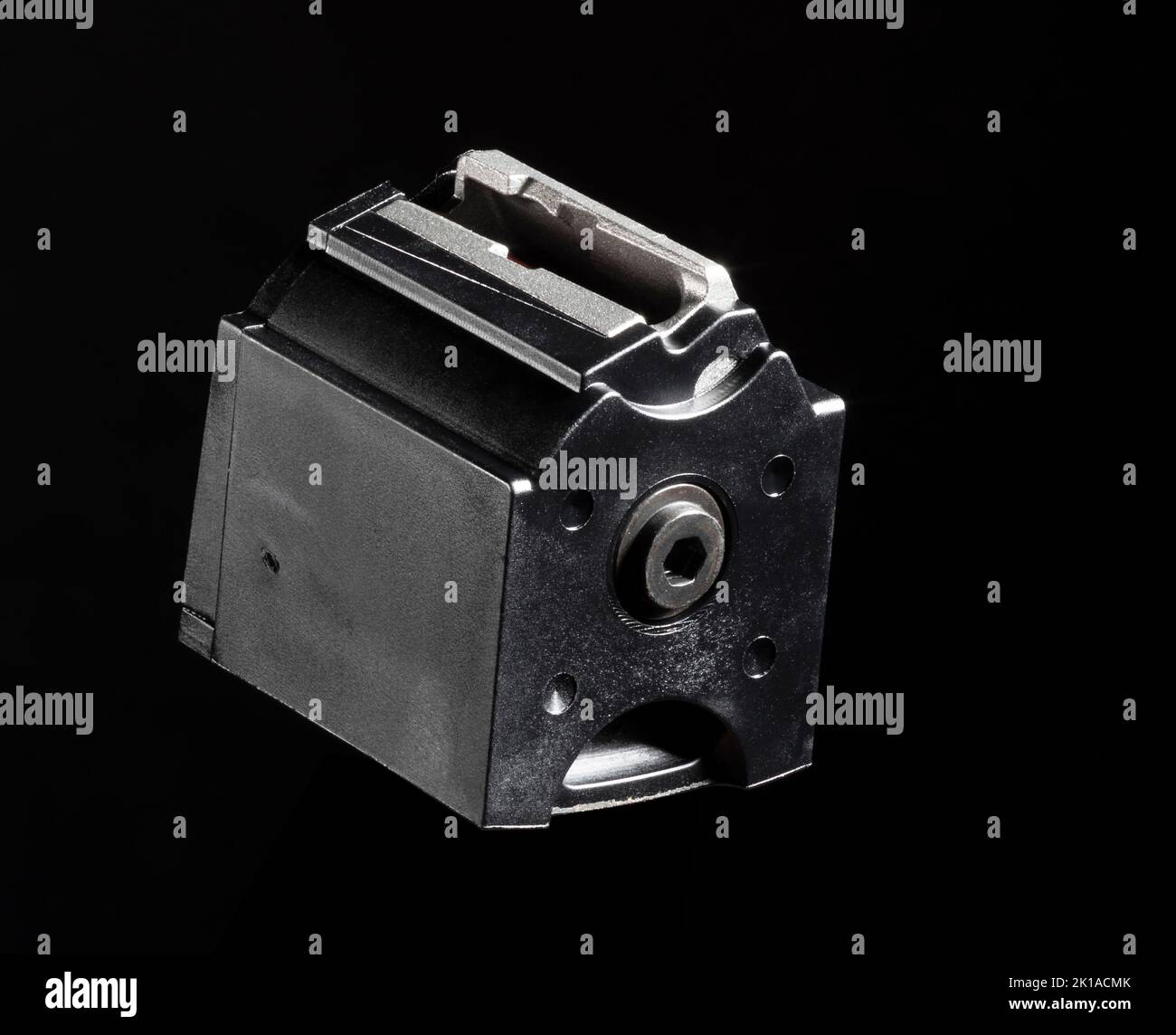 Rotary magazine for a semi-automatic rimfire rifle on a black ...