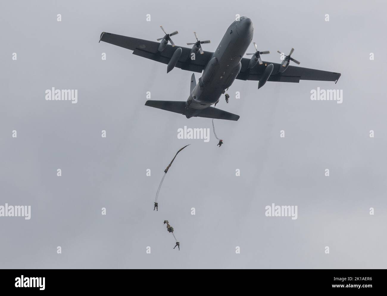 A group of U.S. Army and European Paratroopers conduct an Airborne jump ...