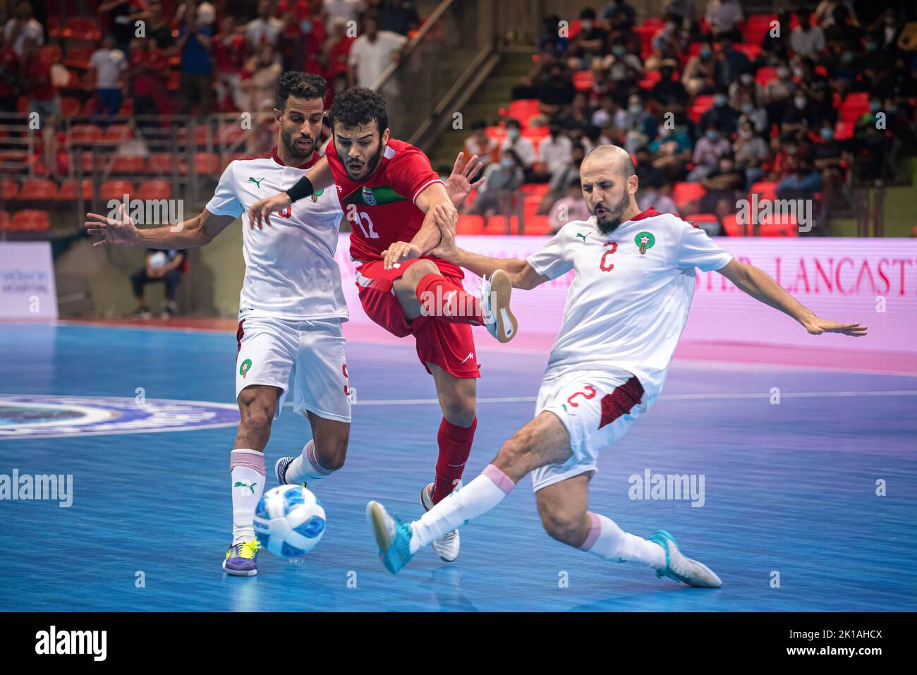 Bangkok, Thailand. 16th Sep, 2022. Mohamed Saoud Achraf (R) of Morocco and Salar Aghapour (C) of ...
