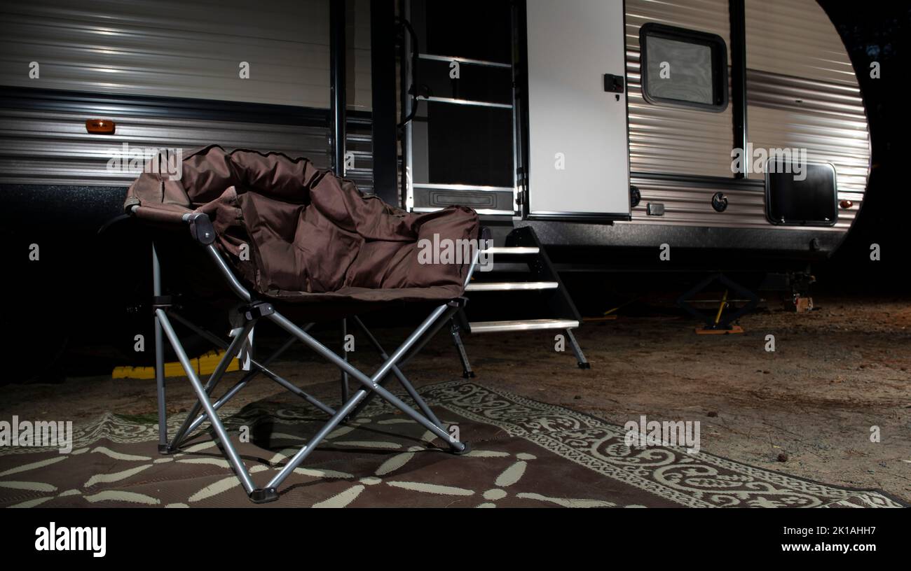 Empty campsite with RV behind at night at Jordan Lake in North Carolina ...
