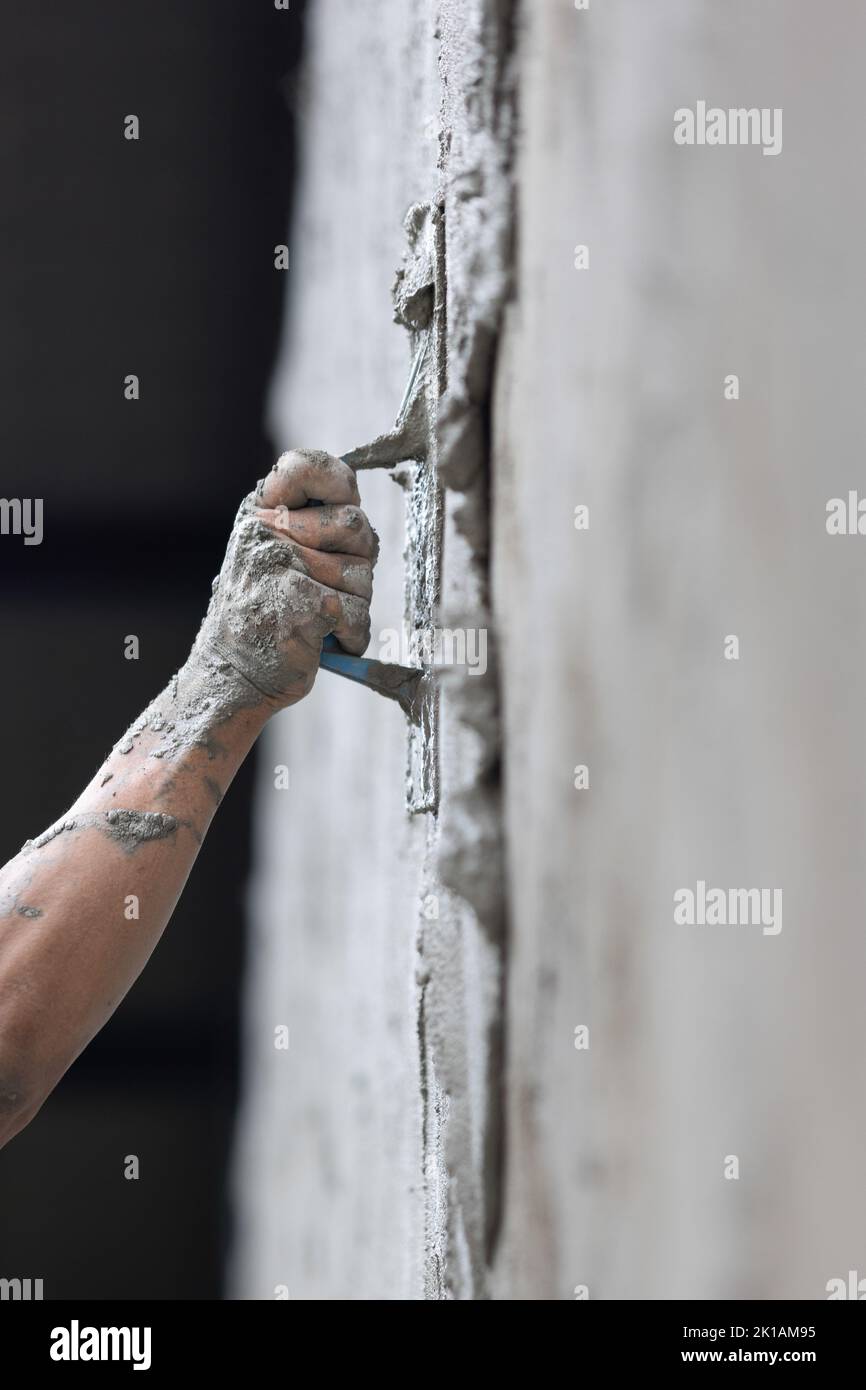 Unsafe construction of Myanmar migrant workers while plastering a wall ...