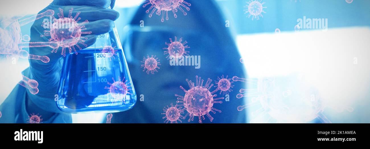 coronavirus on white background against scientist holding up beaker of ...