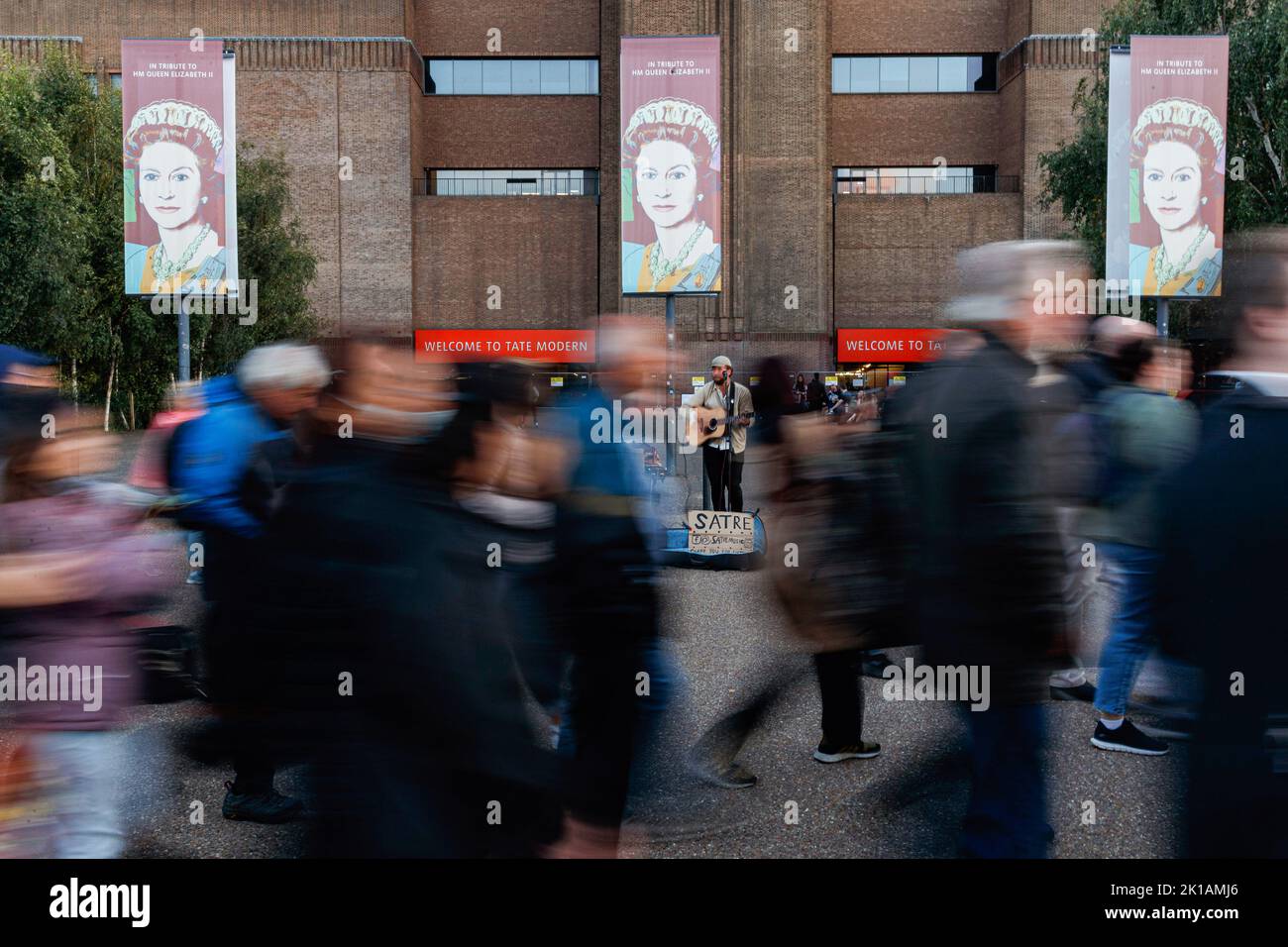 London, UK. 16th Sep, 2022. People walk by banners of Queen Elizabeth ...