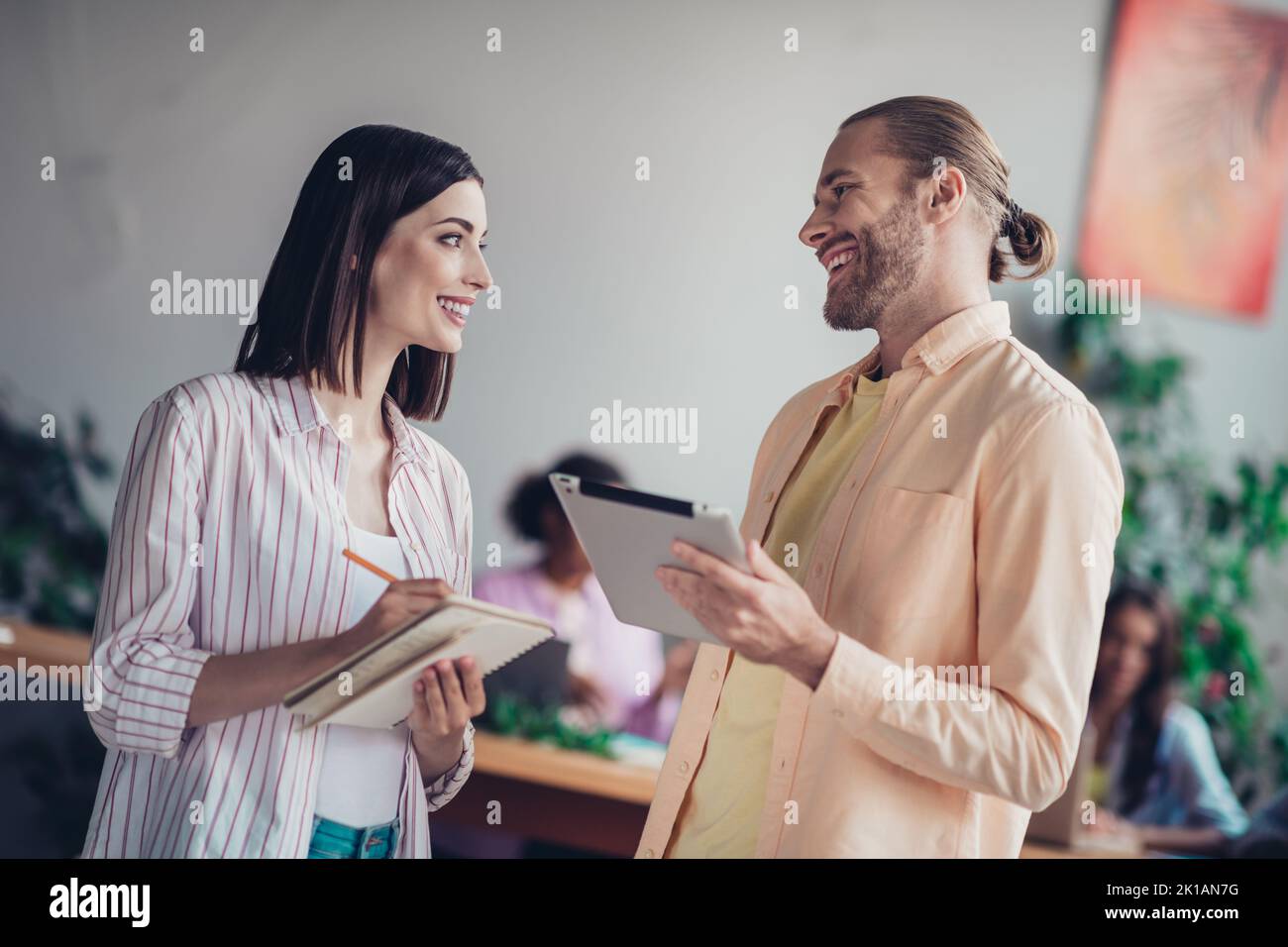 Portrait of cheerful positive people use tablet write take notes ...