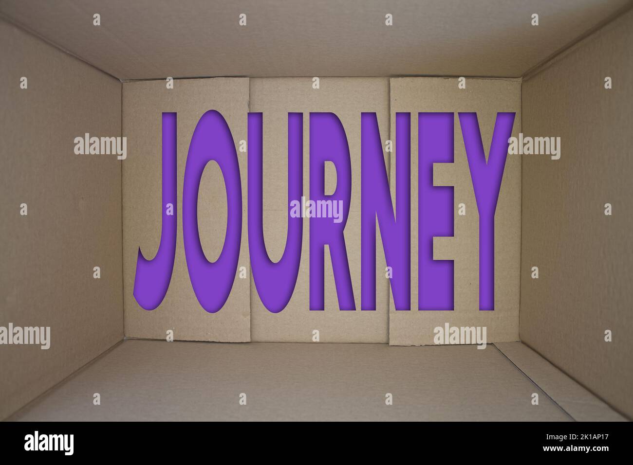 Journey word with cardboard box. Brown folded card box Stock Photo - Alamy