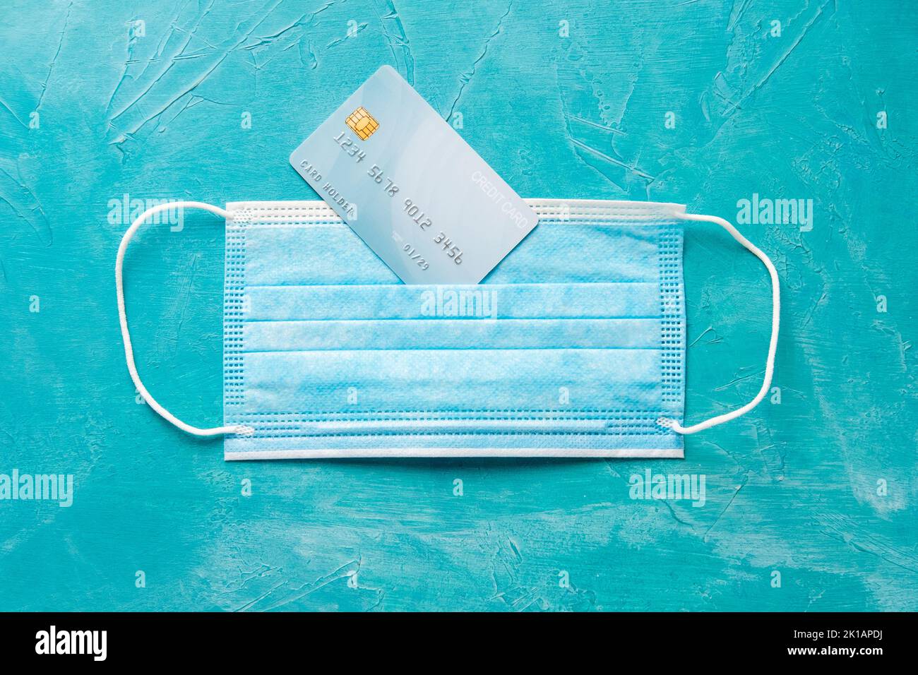 Contactless payment. Hygiene protection. Credit card on medicine face ...