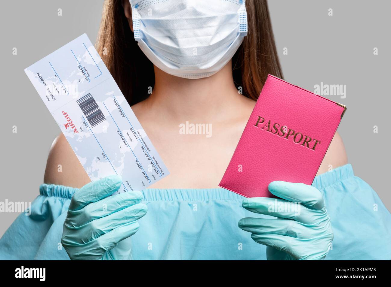 Quarantine measures. Stay safe. Tourist woman holding passport and ...