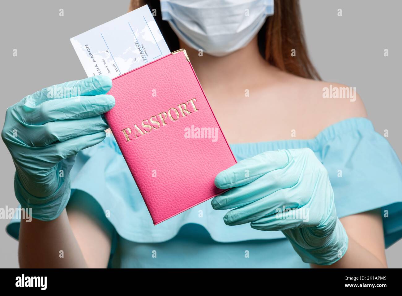 Pandemic protection. COVID-19 prevention. Tourist woman with id and ...