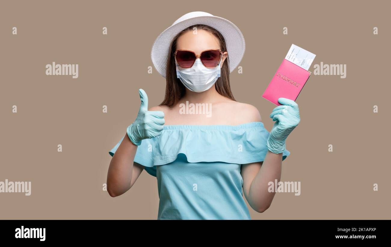 Pandemic health care. Passport control. Woman with foreign id and ...