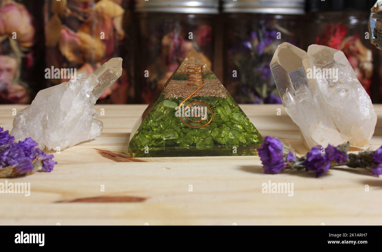 Quartz Crystals and Stone Pyramid With Flower. Relaxation and ...
