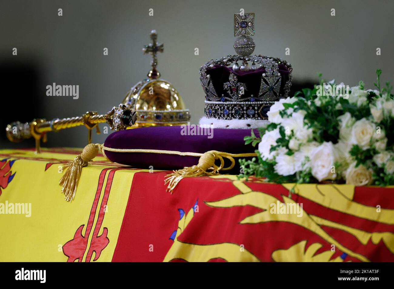 The coffin of Queen Elizabeth II, draped in the Royal Standard with the ...