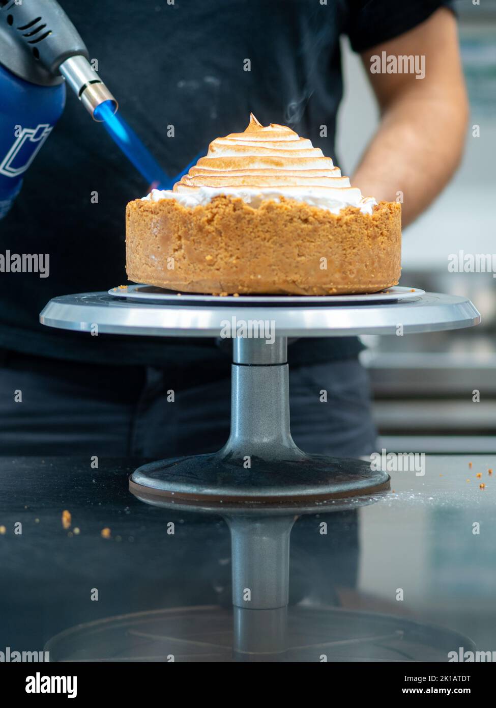 Baker using pastry burner flame hi-res stock photography and images - Alamy