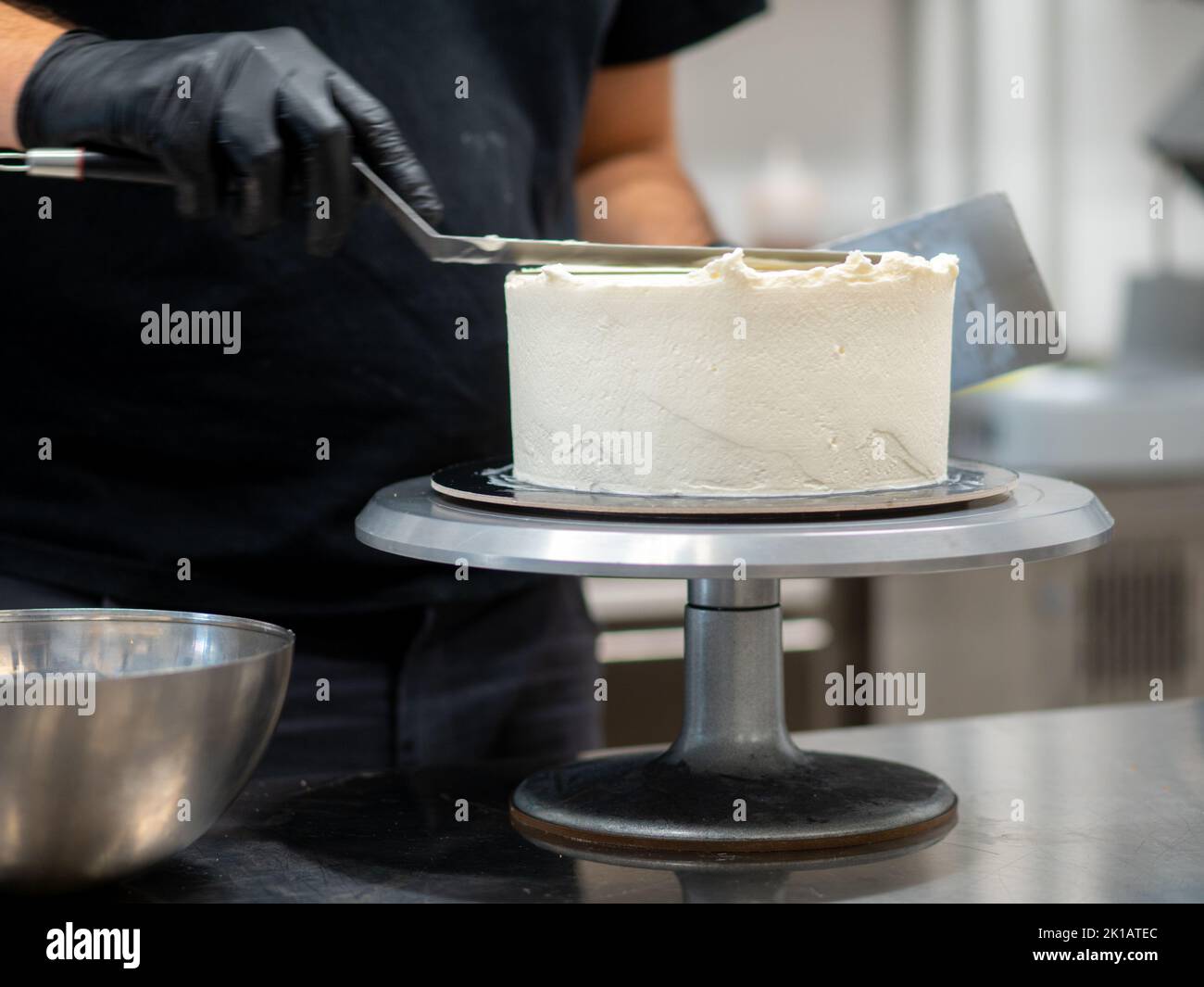chef at work preparing a drip cake Stock Photo - Alamy