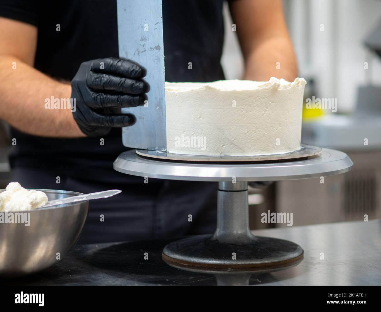 chef at work preparing a drip cake Stock Photo - Alamy