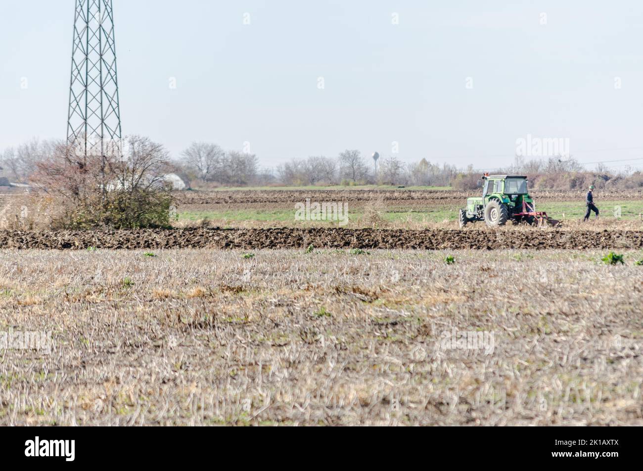 Winter agricultural panoramic landscape with fields and tractor Stock ...