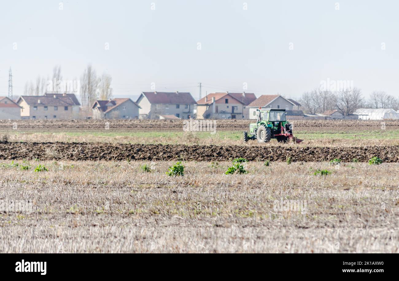 Winter agricultural panoramic landscape with fields and tractor Stock ...