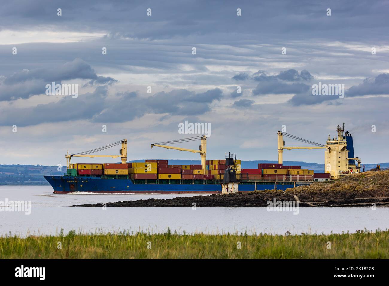 Container ship passing Battery Point Stock Photo - Alamy