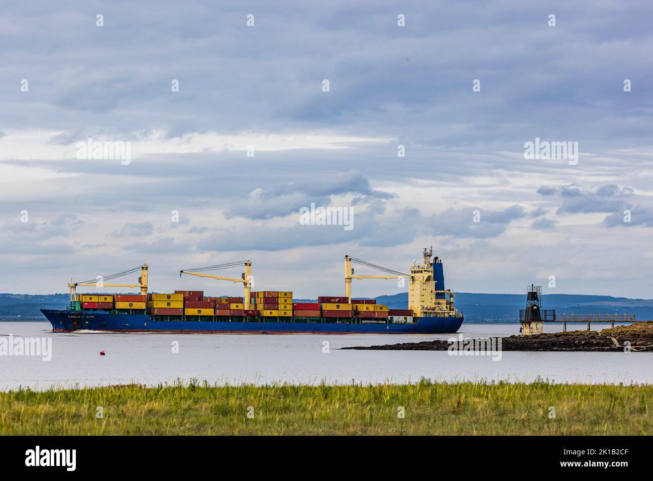 Container ship passing Battery Point Stock Photo - Alamy