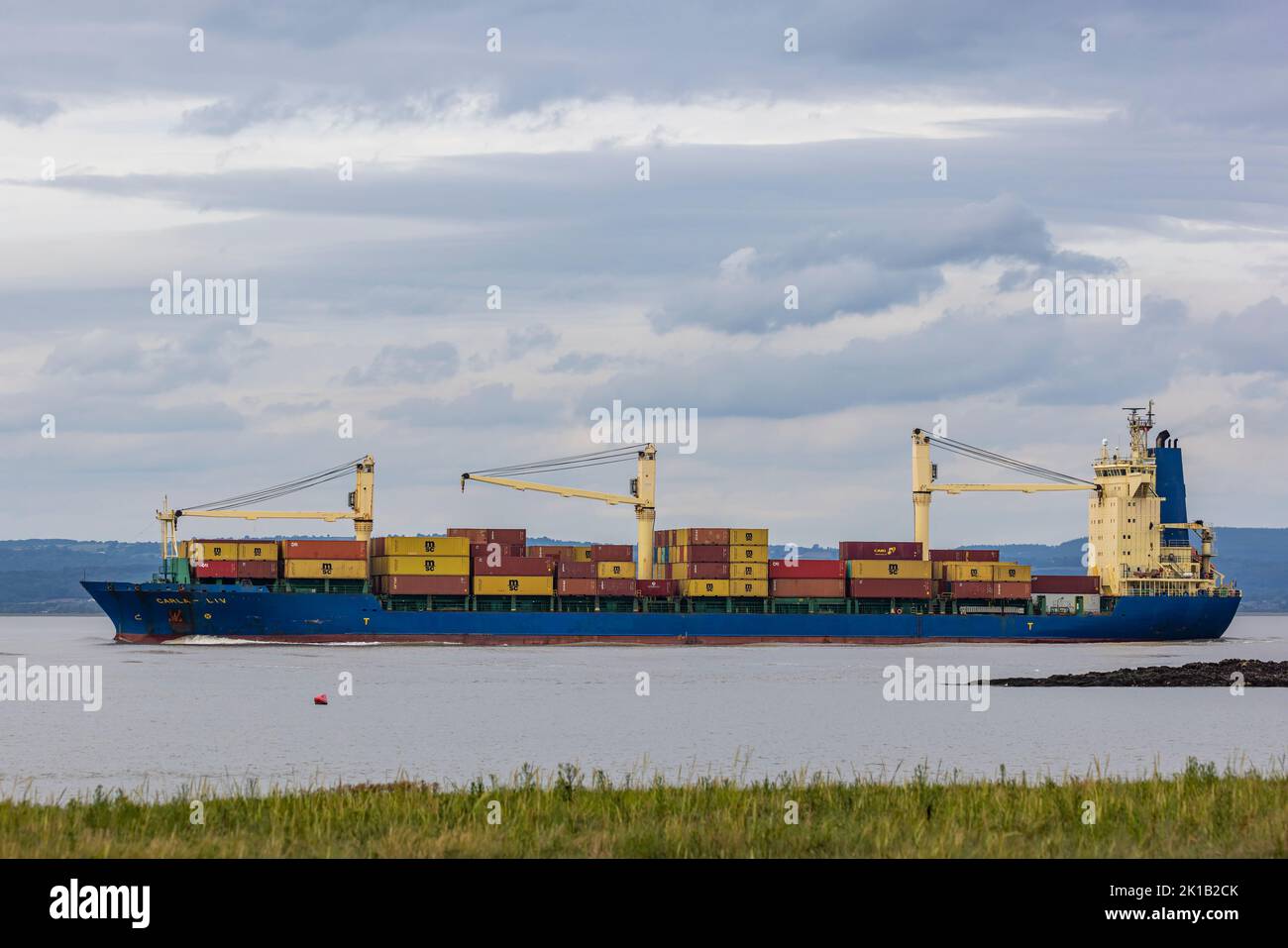 Container ship passing Battery Point Stock Photo - Alamy
