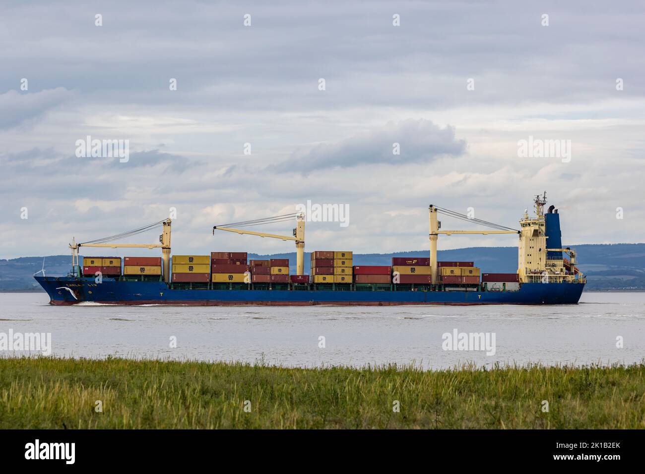 Ship heading out to sea Stock Photo - Alamy