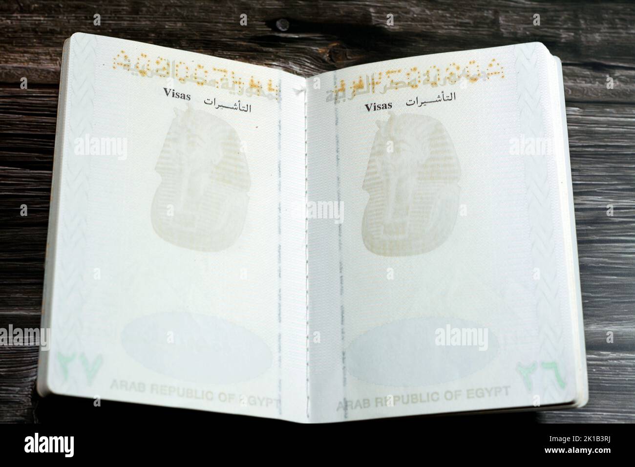 Egyptian passport isolated on wooden background, Arab republic of Egypt ...