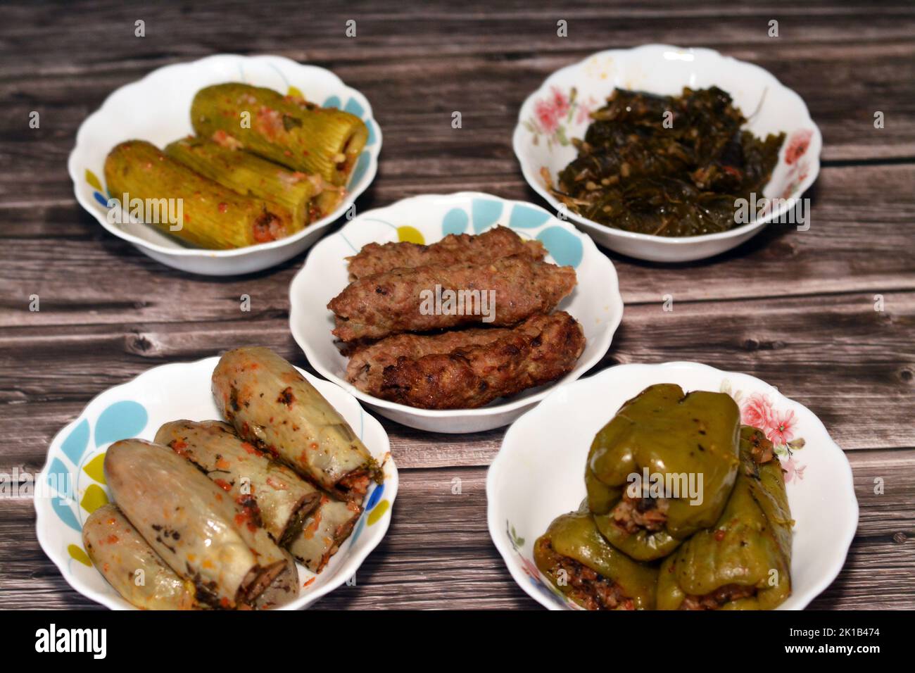 Stuffed squash zucchini Mahshi, eggplants, wrapped grape leaves, bell ...