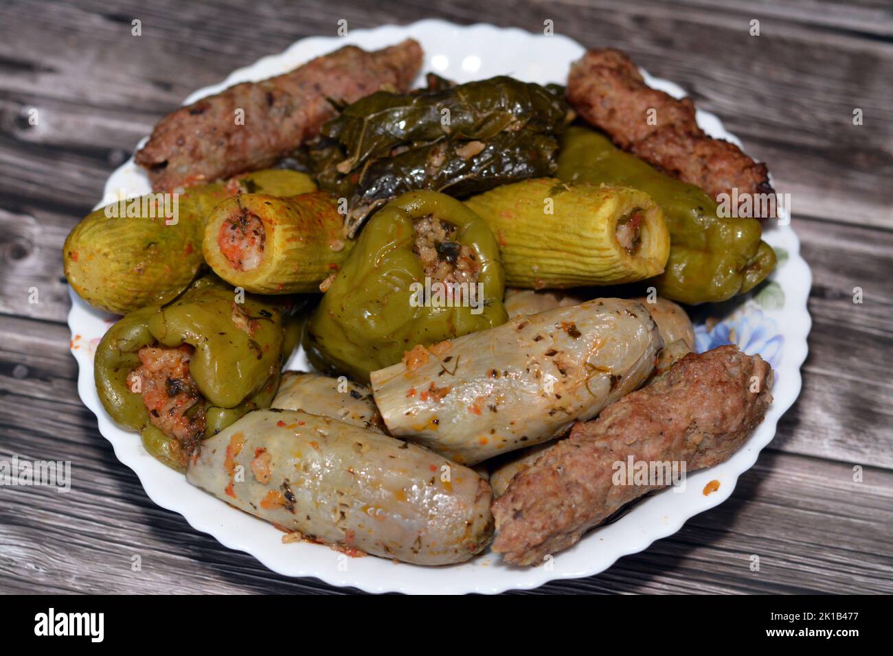 Stuffed squash zucchini Mahshi, eggplants, wrapped grape leaves, bell ...