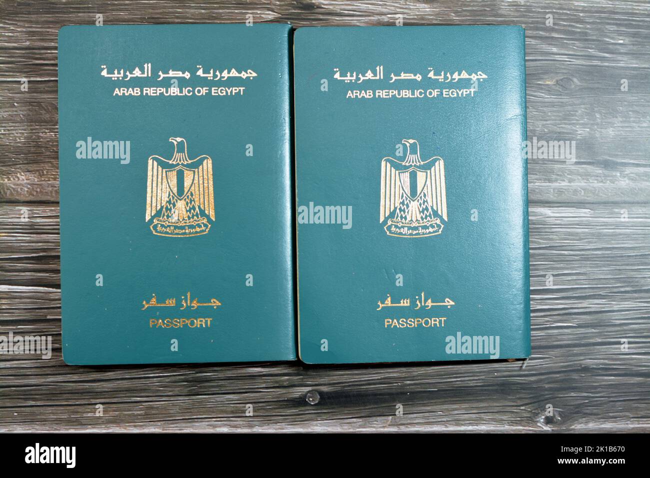 Egyptian passport isolated on wooden background, Arab republic of Egypt ...