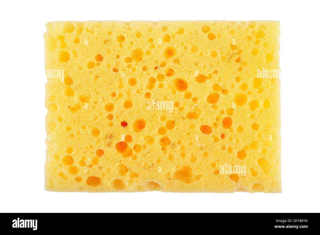 Yellow sponge for washing dishes and daily cleaning in the house close ...
