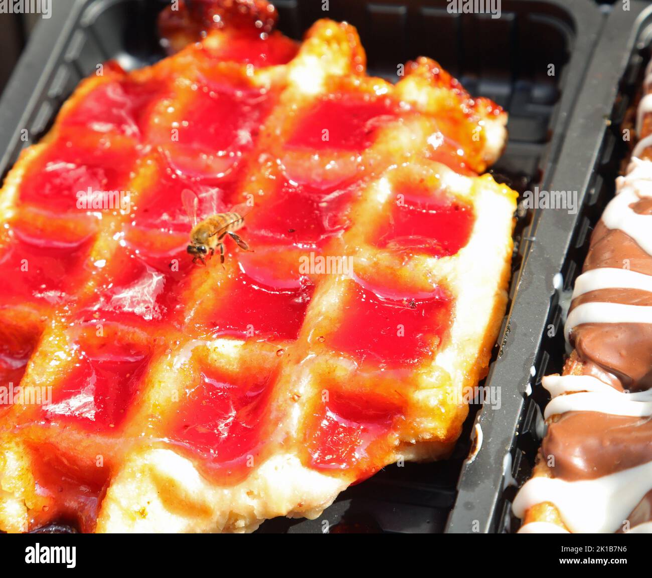 waffle the typical dessert of Belgium with a sweet strawberry and cream ...