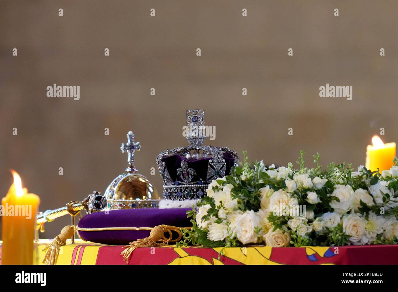 The coffin of Queen Elizabeth II, draped in the Royal Standard with the ...