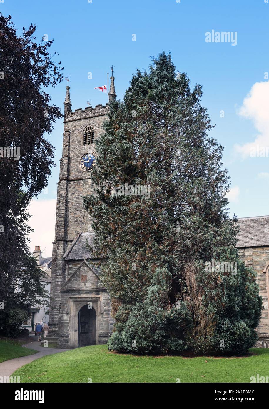 The clock tower and south porch at Tavistock Parish Church seen across ...