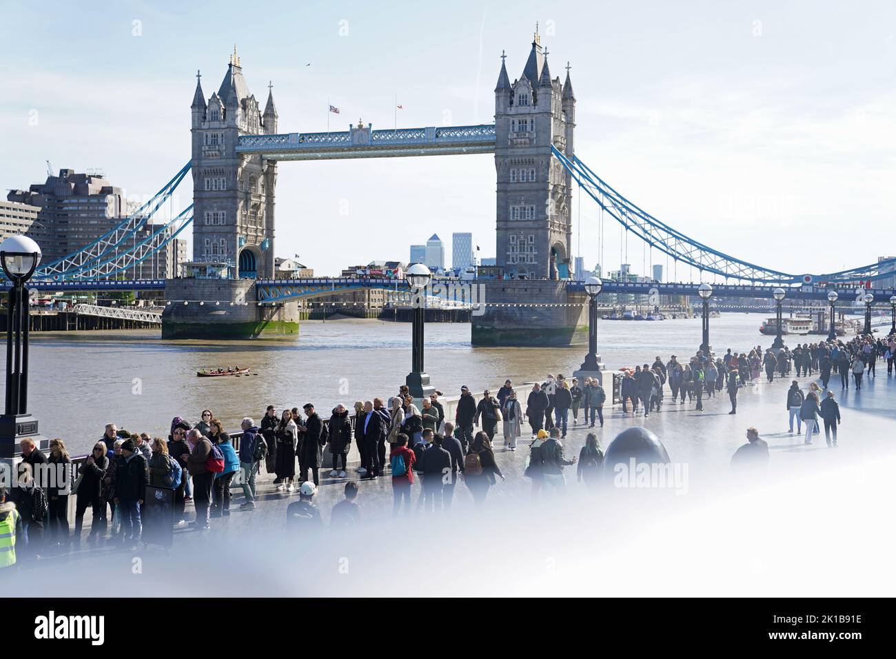 Members of the public in the queue near Tower Bridge in London, as they ...