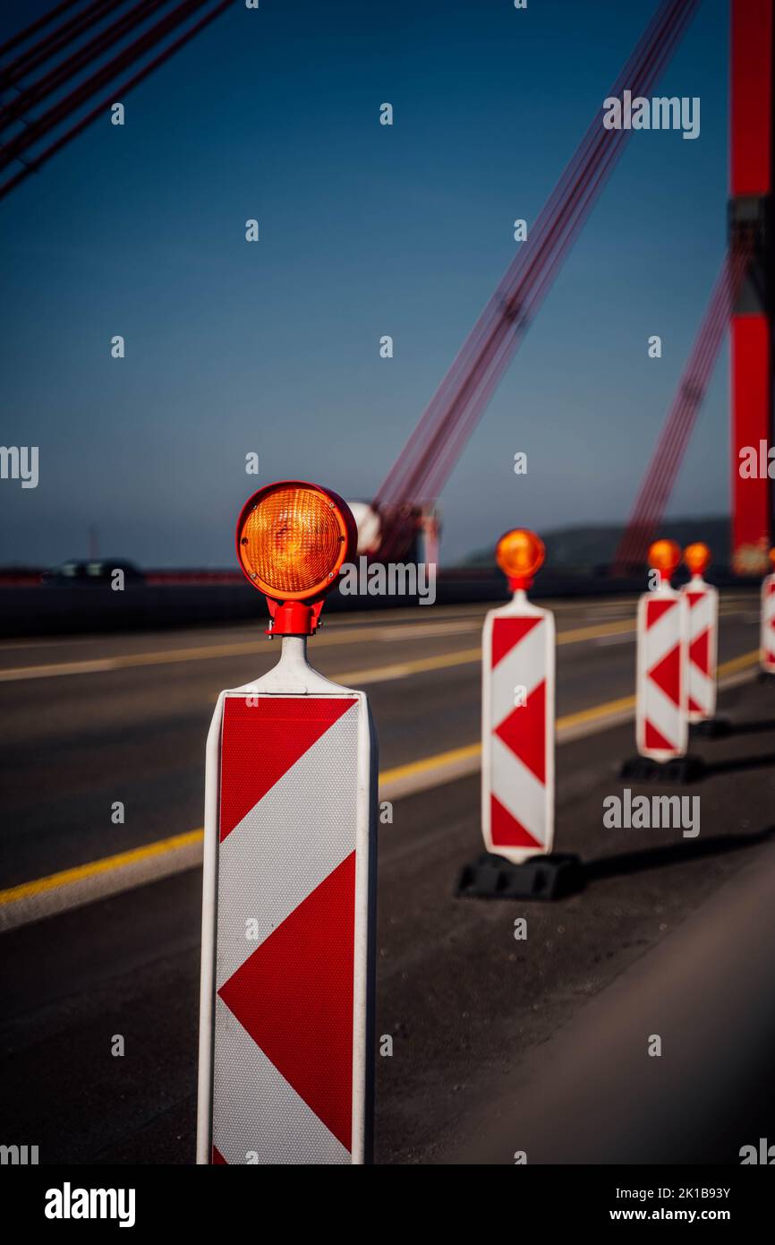 A vertical shot of road signs Stock Photo - Alamy