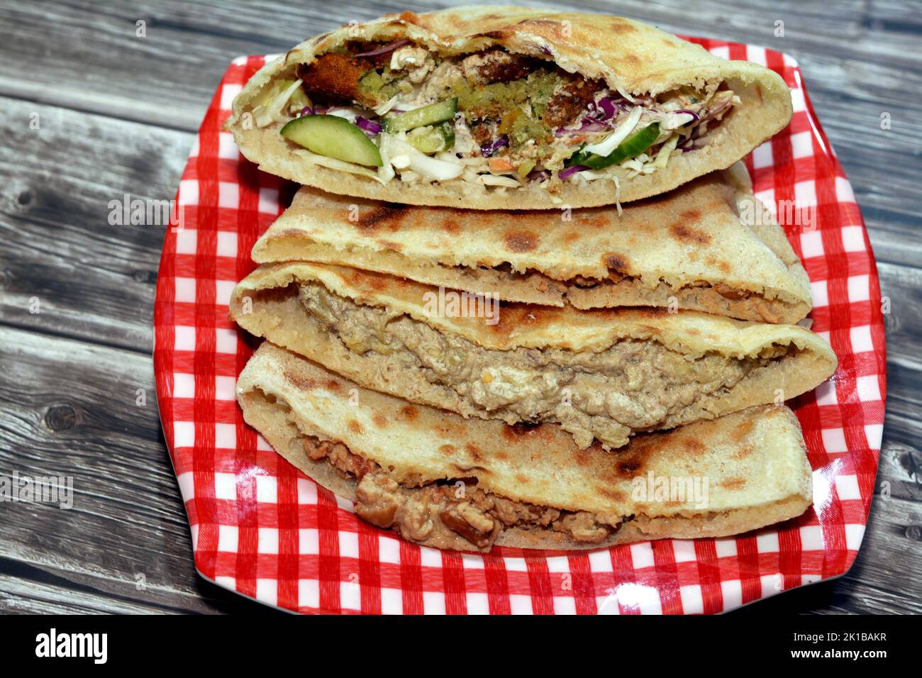 Traditional Egyptian popular breakfast street sandwiches of mashed fava ...