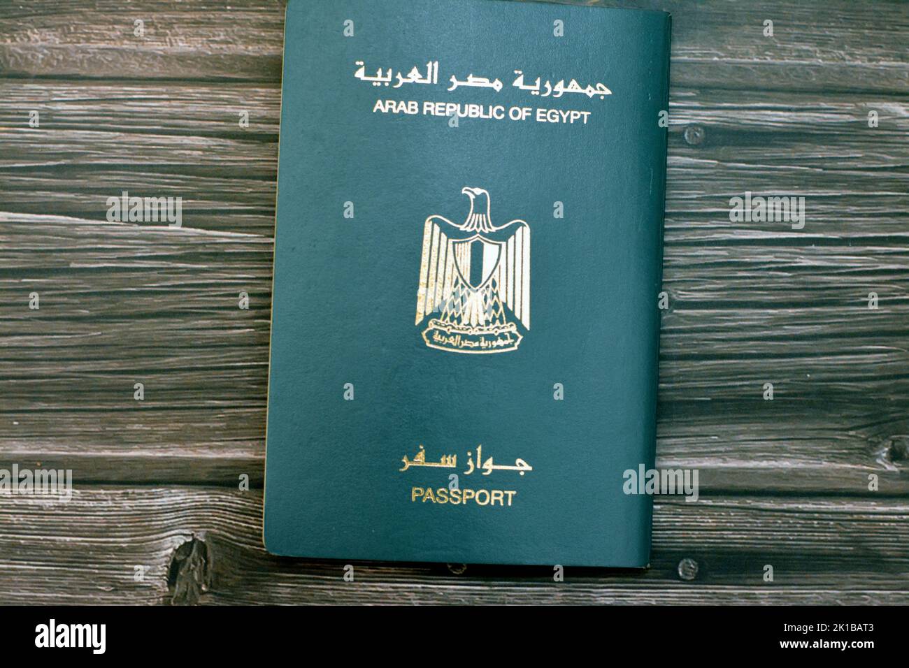 Egyptian passport isolated on wooden background, Arab republic of Egypt ...