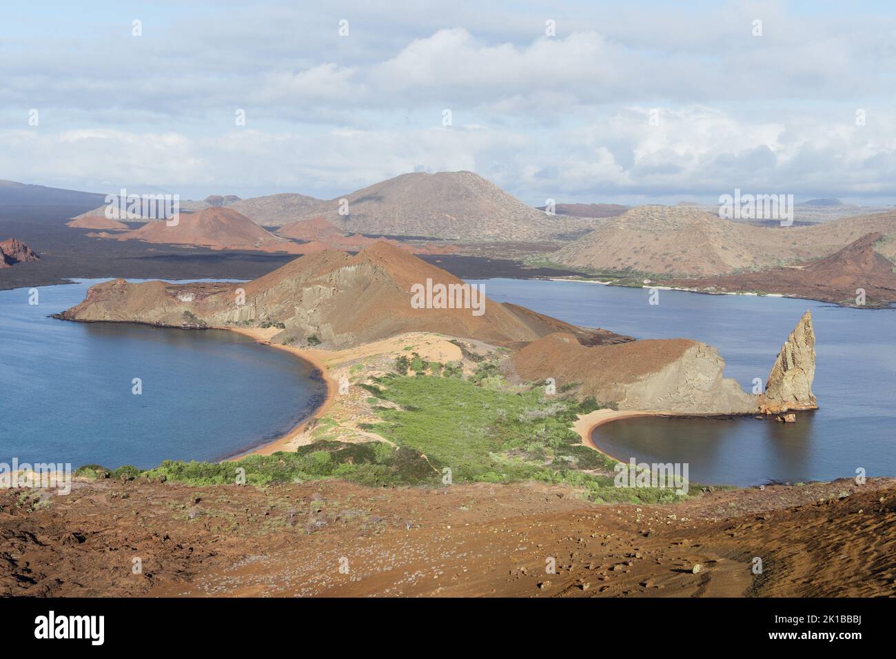 A scenic view of terrains and hills surrounded by water Stock Photo - Alamy
